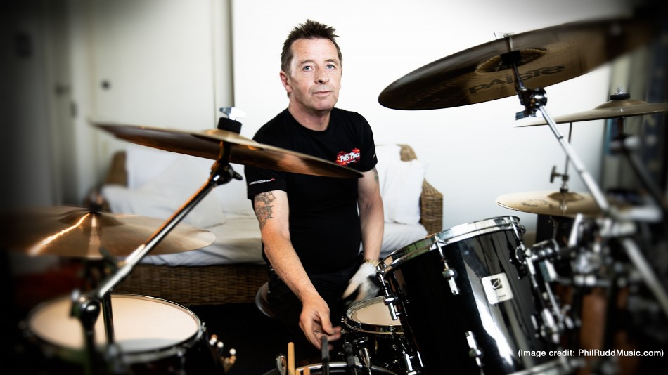 AC/DC Drummer Phil Rudd Takes a Break from Touring to Care for Partner ...
